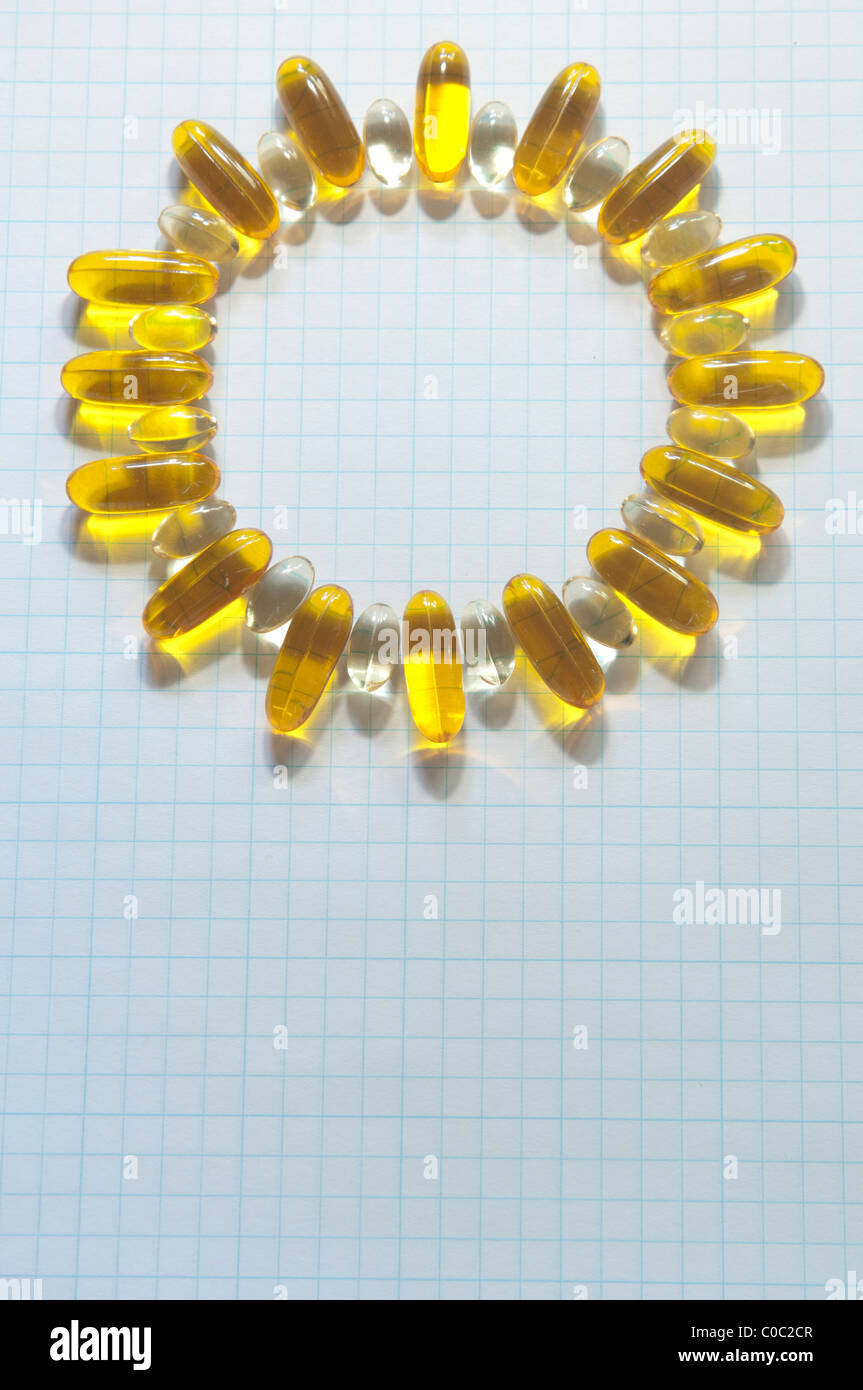 Circle of supplement capsules Stock Photo - Alamy