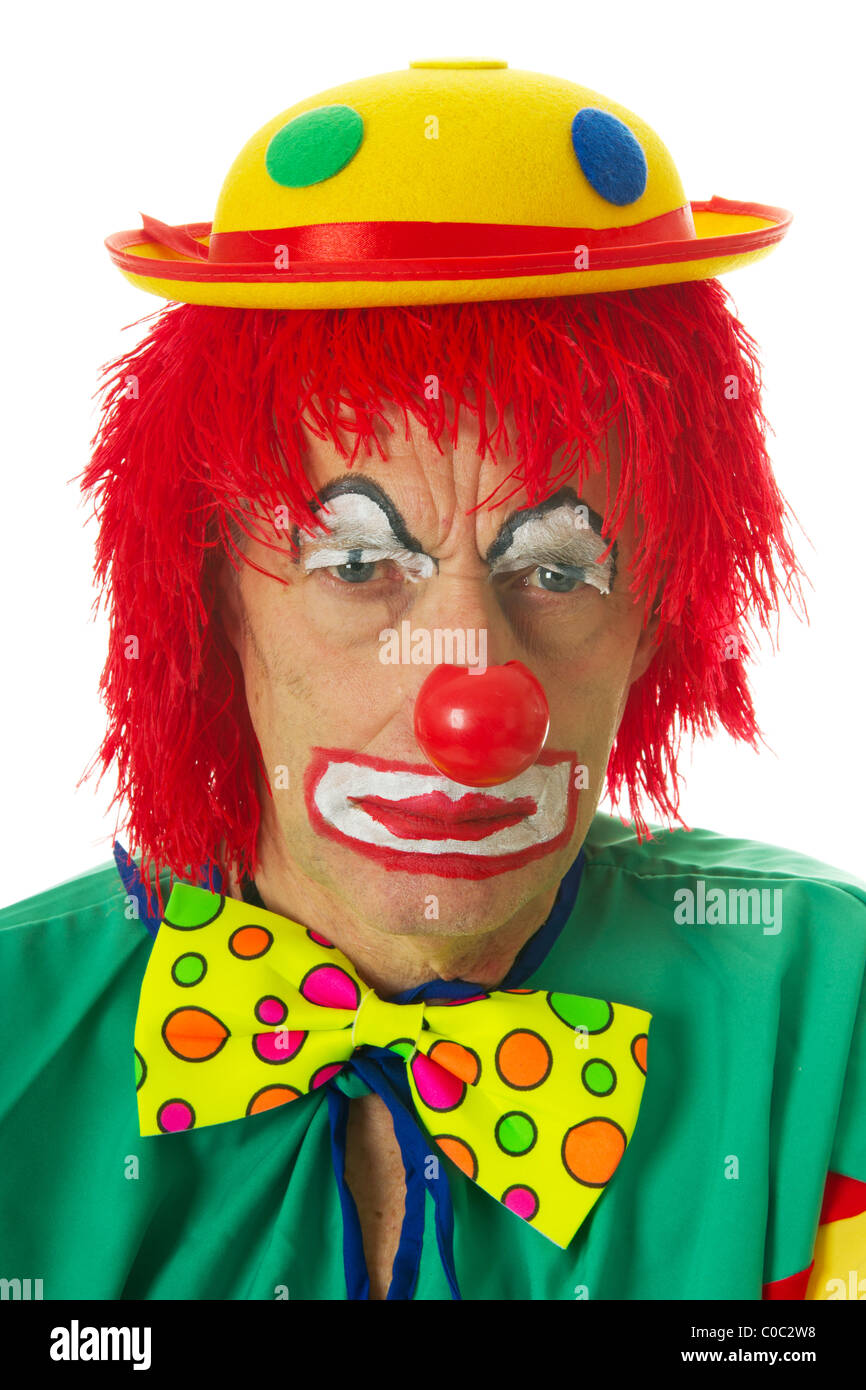 Portrait of a very depressed senior clown in the studio Stock Photo - Alamy