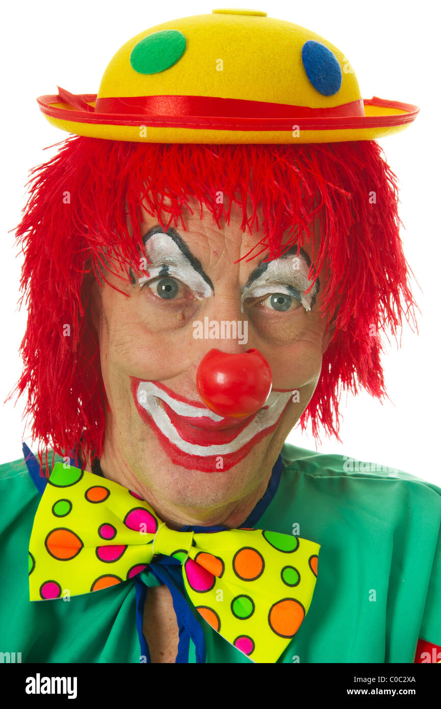 Funny laughing senior clown as studio portrait Stock Photo - Alamy
