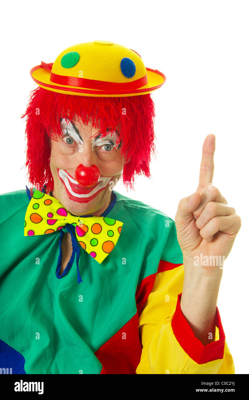 Funny clown portrait with finger up on white background Stock Photo - Alamy