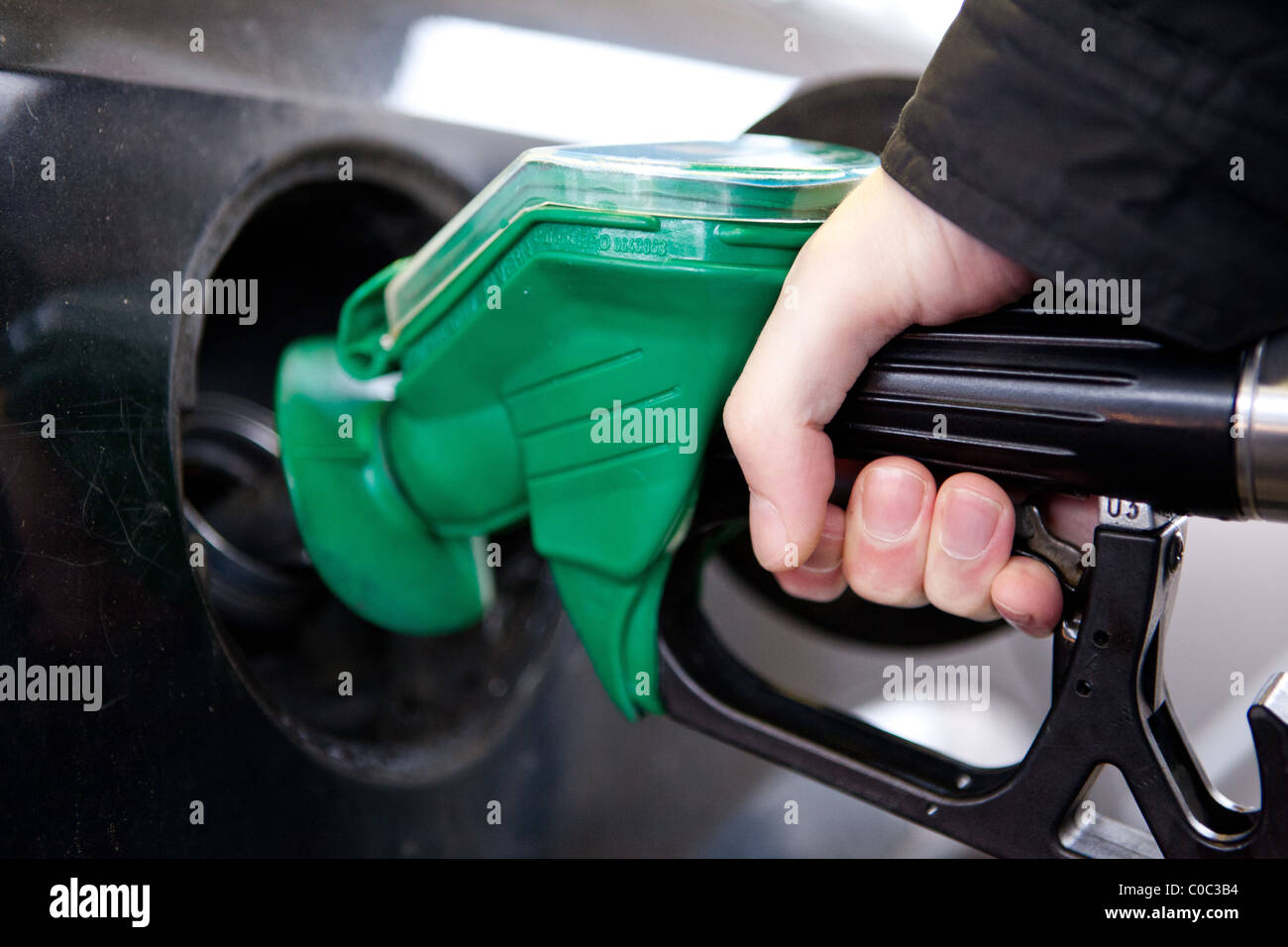Putting petrol in car hi-res stock photography and images - Alamy