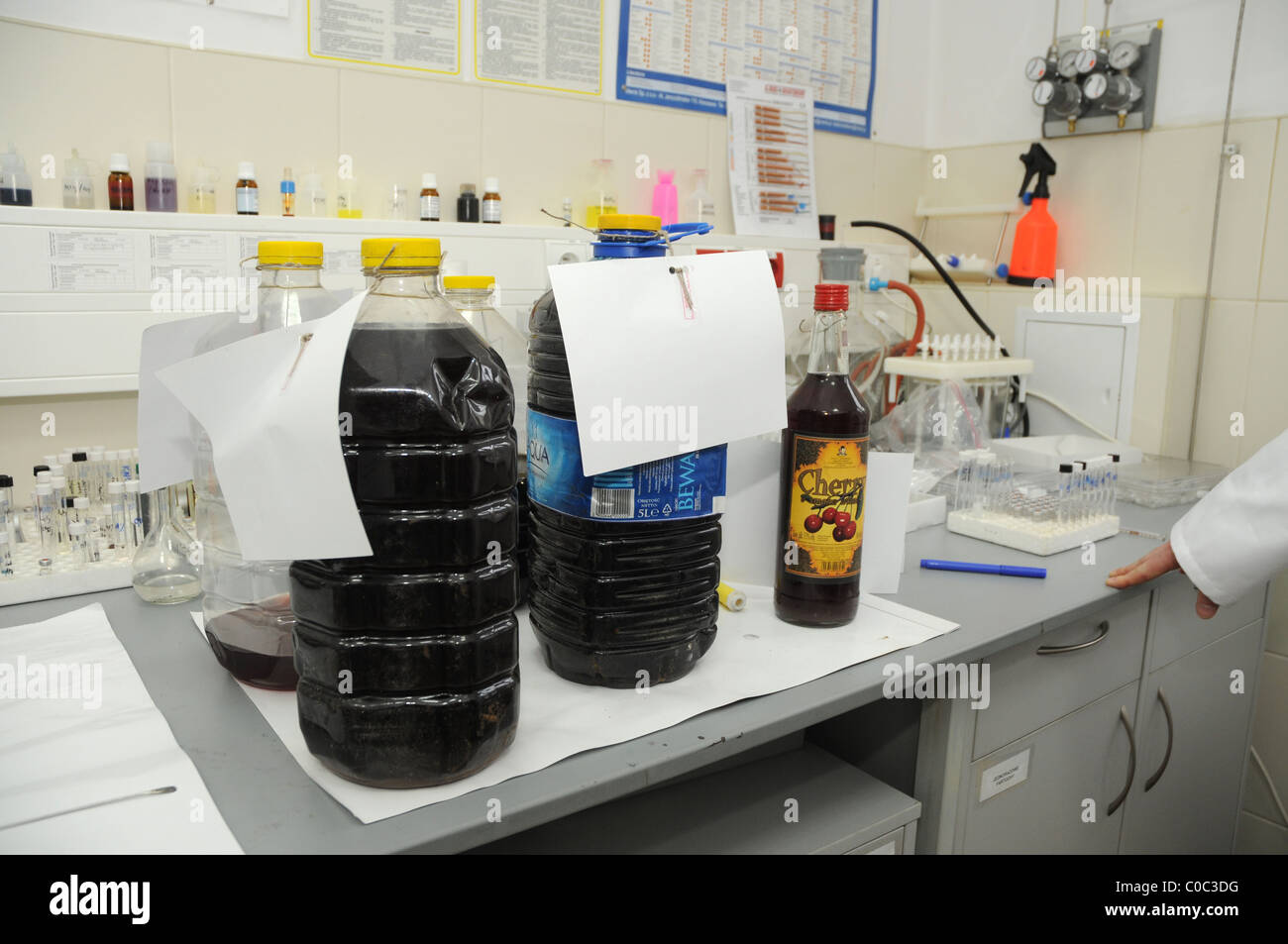 bottles with illegal alcohol prepared for chemistry analysis in The ...