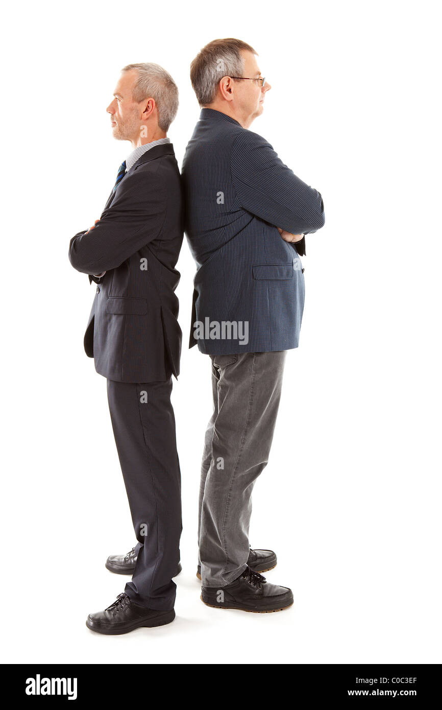 Two business men back to back over white background with arms crossed ...
