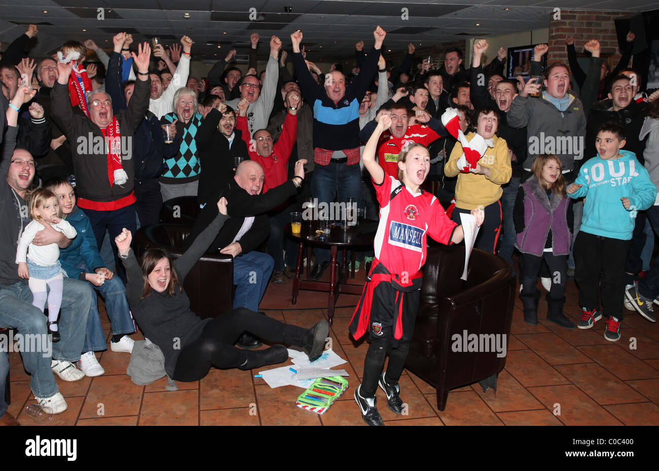 Crawley Town fans celebrate after drawing Manchester United in the next ...