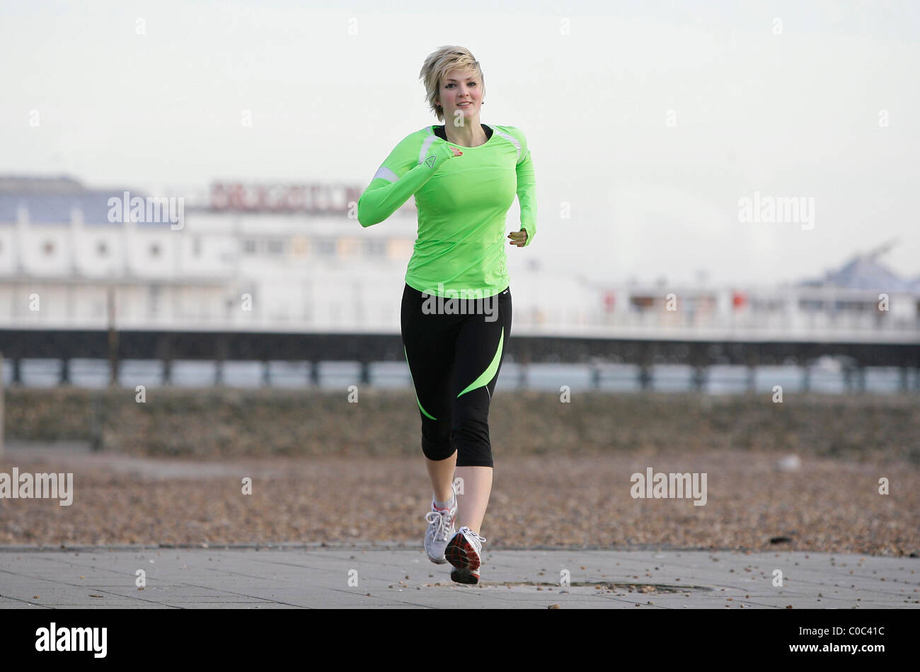 Brighton seafront runner hi-res stock photography and images - Alamy
