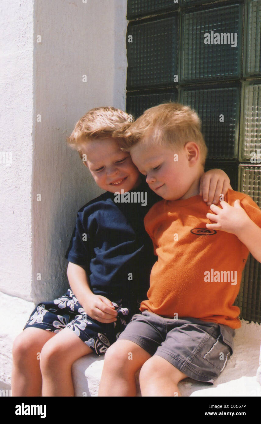 Two young close brothers Stock Photo - Alamy