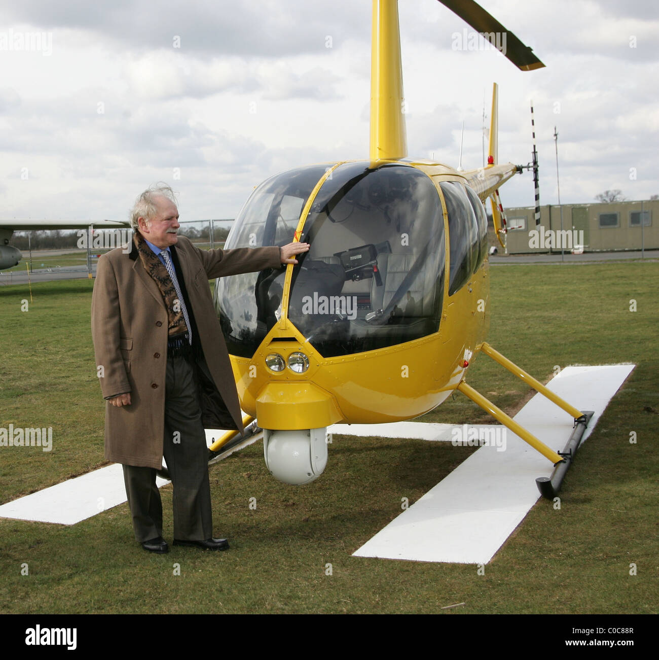 David Jason standing by a Robinsons R22 helicopter Official opening of ...