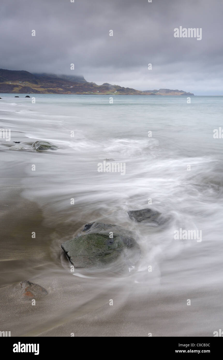 Tide movement on a stormy day on Staffin Beach, Isle of Skye, Hebrides ...