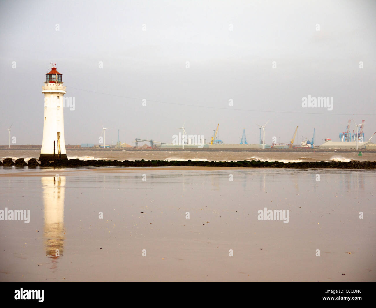 Lighthouse and Liverpool docks in the background Stock Photo - Alamy