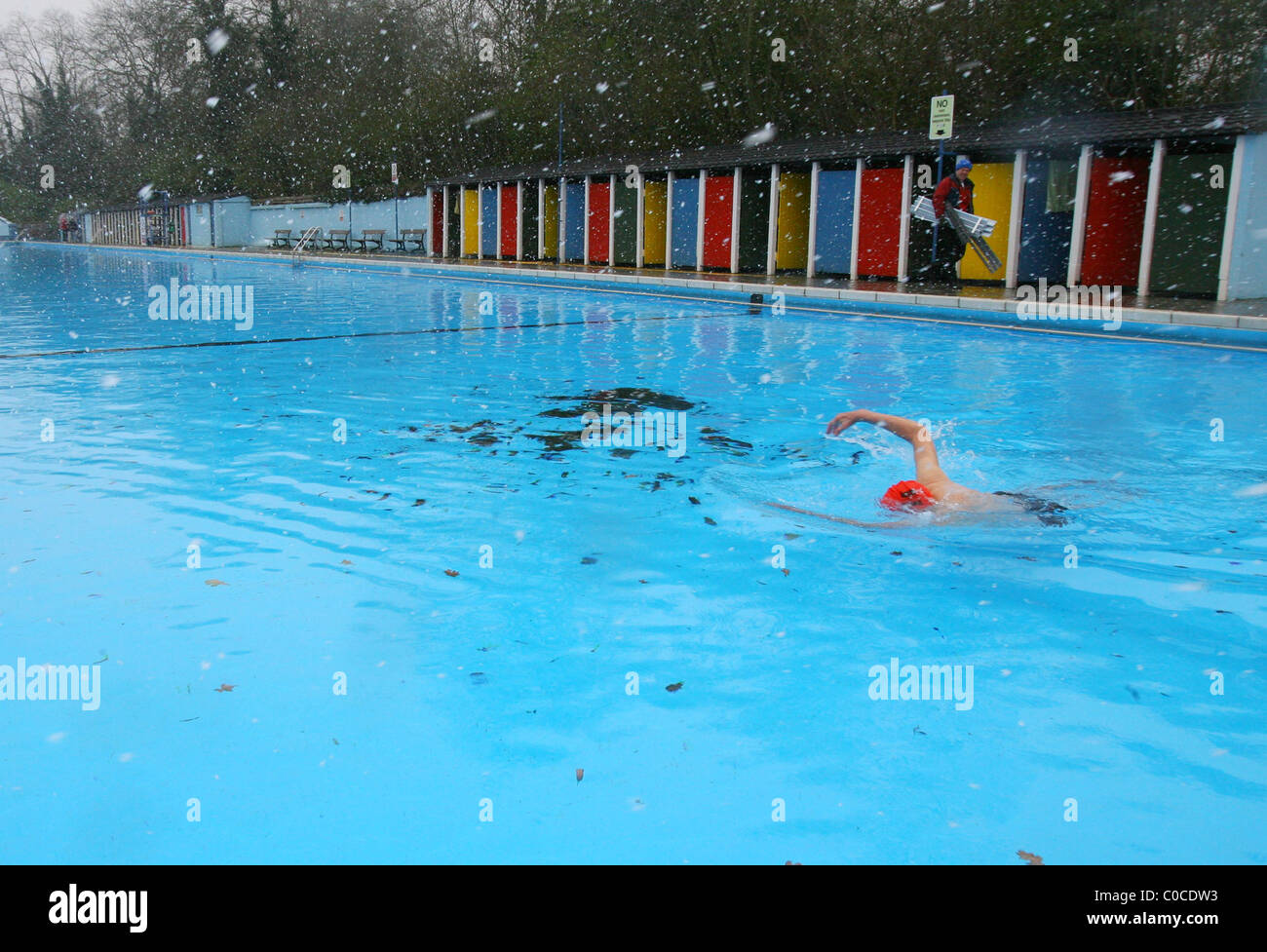 Swimmers take a morning dip during Britain's first white Easter in ten ...
