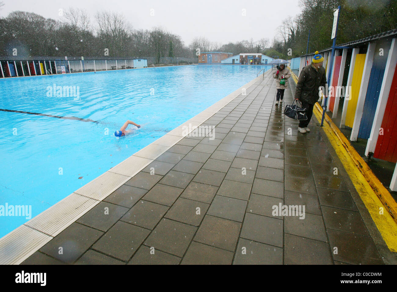 Swimmers take a morning dip during Britain's first white Easter in ten ...