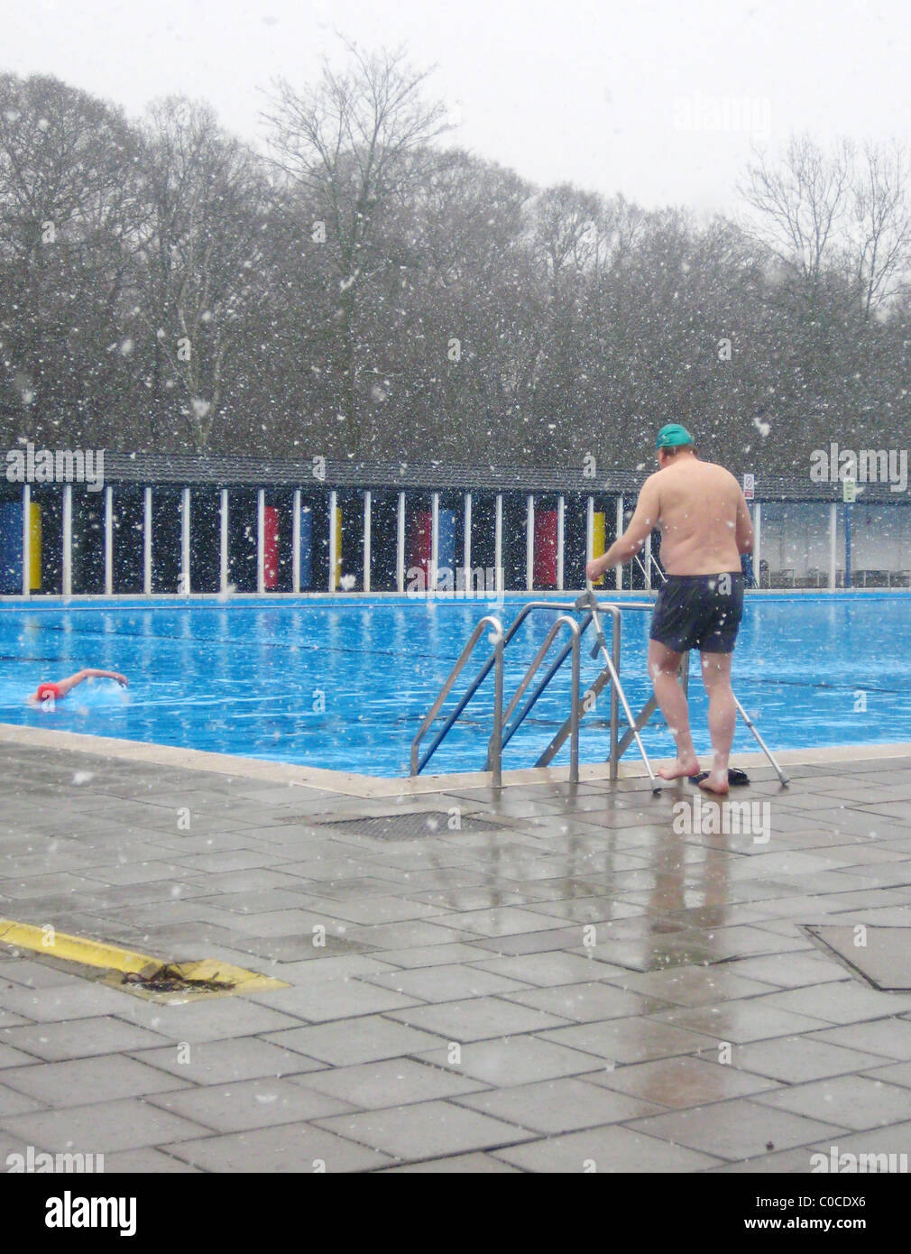 Swimmers take a morning dip during Britain's first white Easter in ten ...