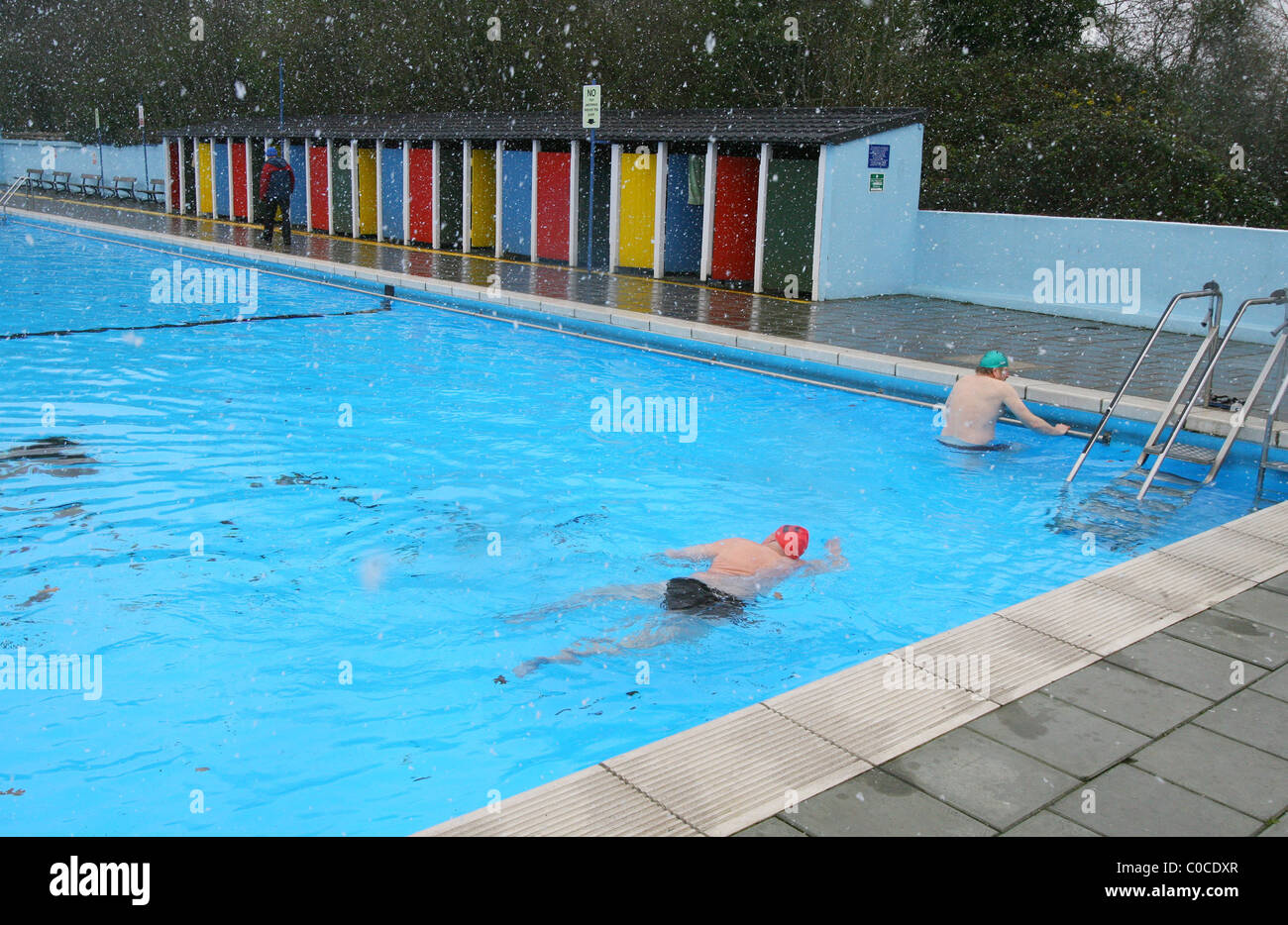 Swimmers take a morning dip during Britain's first white Easter in ten ...
