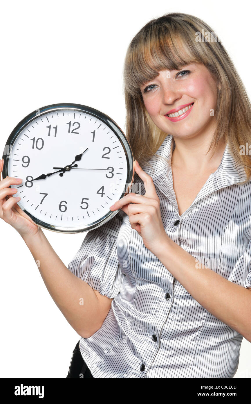 The business woman with clock in hands. It is isolated on a white ...