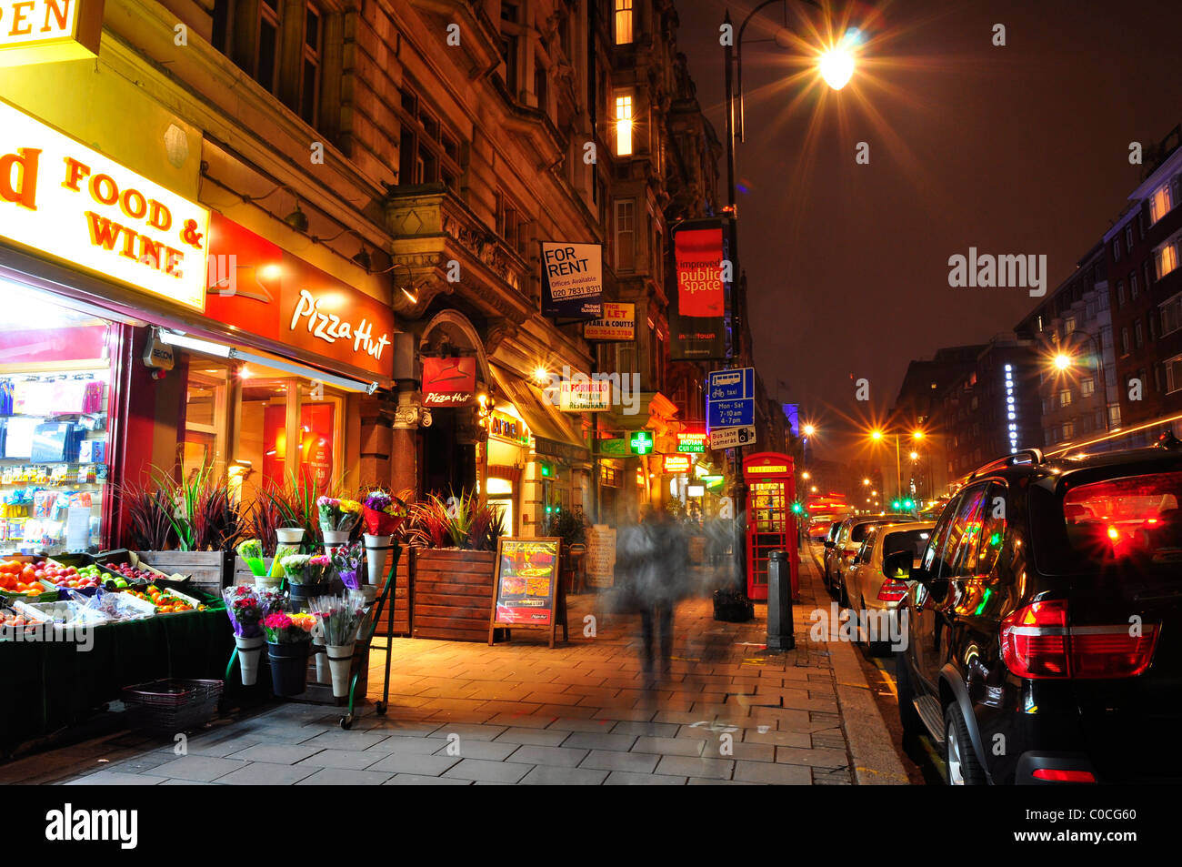 A High street in London at night Stock Photo - Alamy