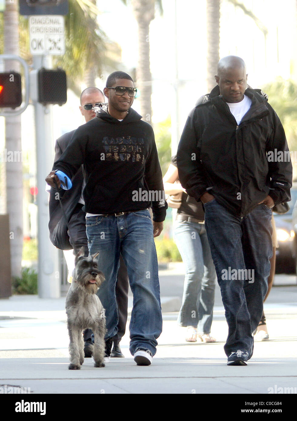 Usher takes his dog for a walk Stock Photo - Alamy