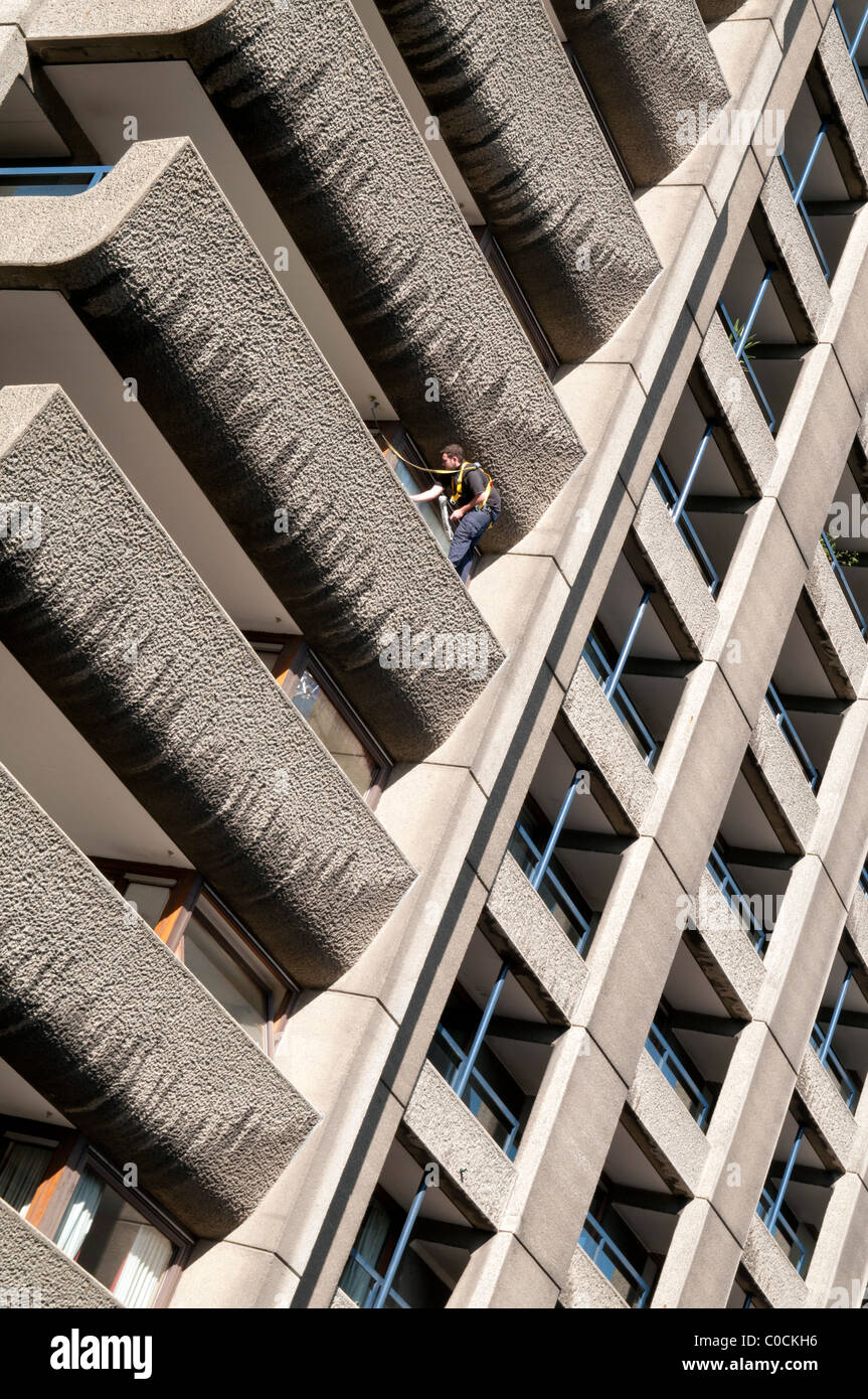 UK-Window cleaner at residential tower block and arts complex at the ...
