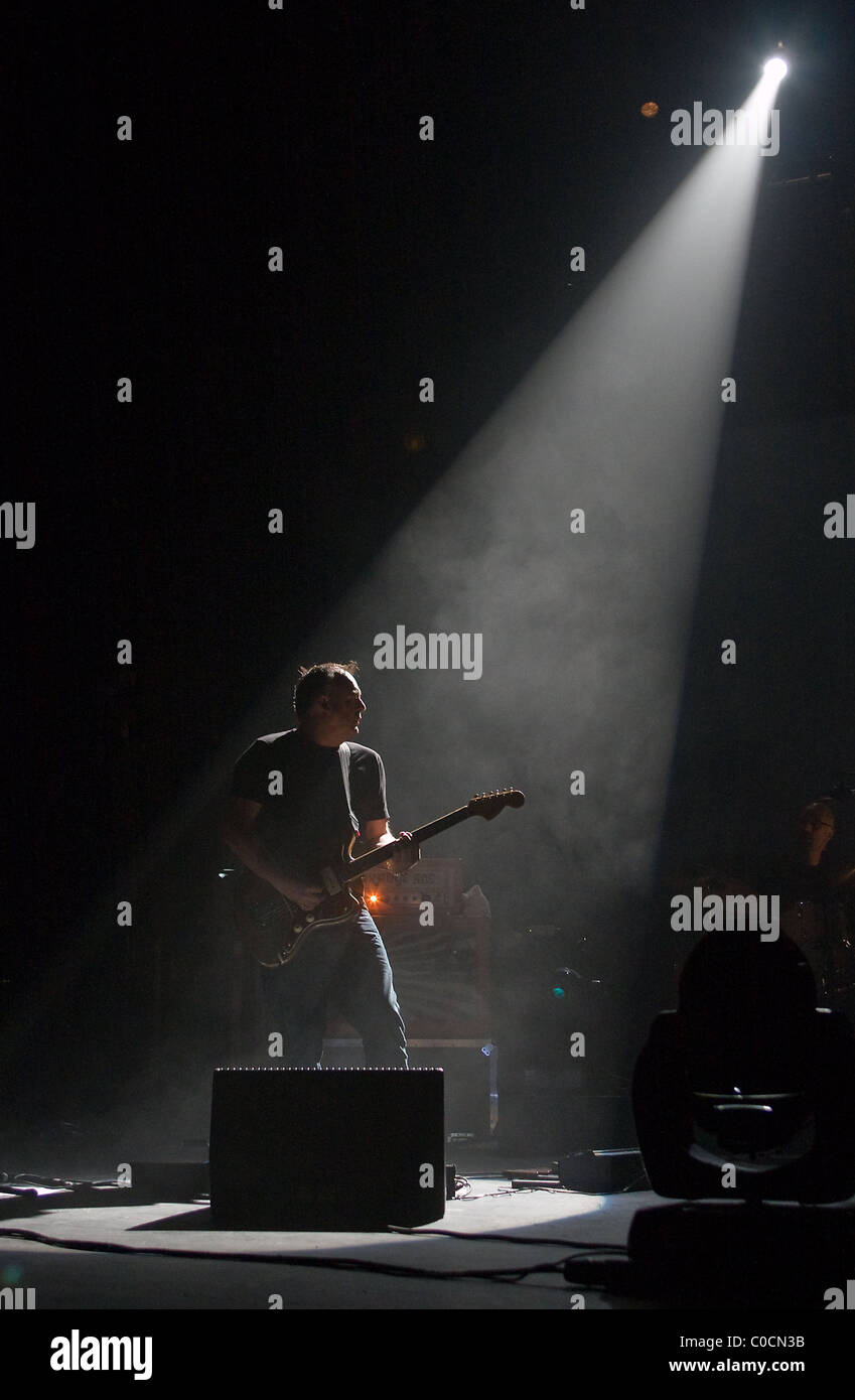 Adrian Utley of Portishead in the spotlight performing at the ...