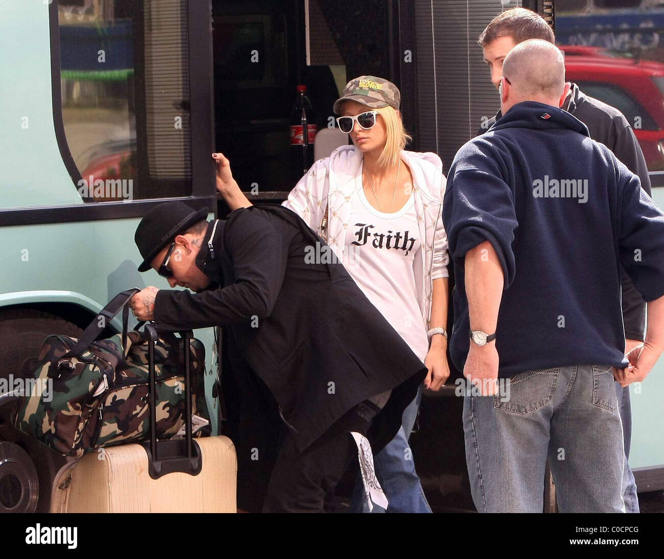 Paris Hilton and boyfriend Benji Madden Visit a music store after ...