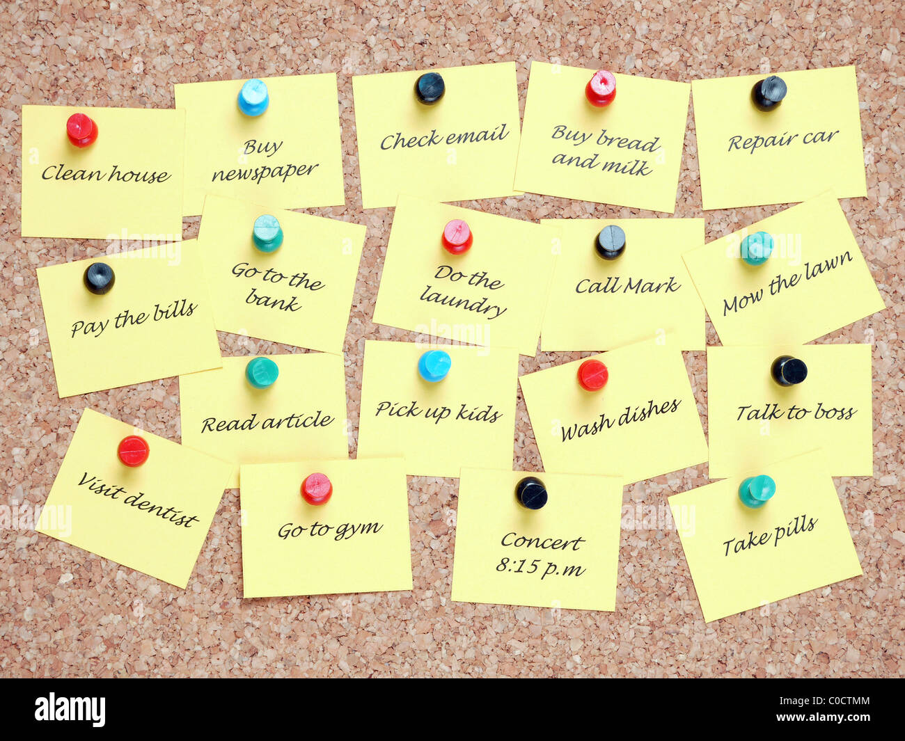 Yellow post-it notes with various written to-do tasks affixed to the ...