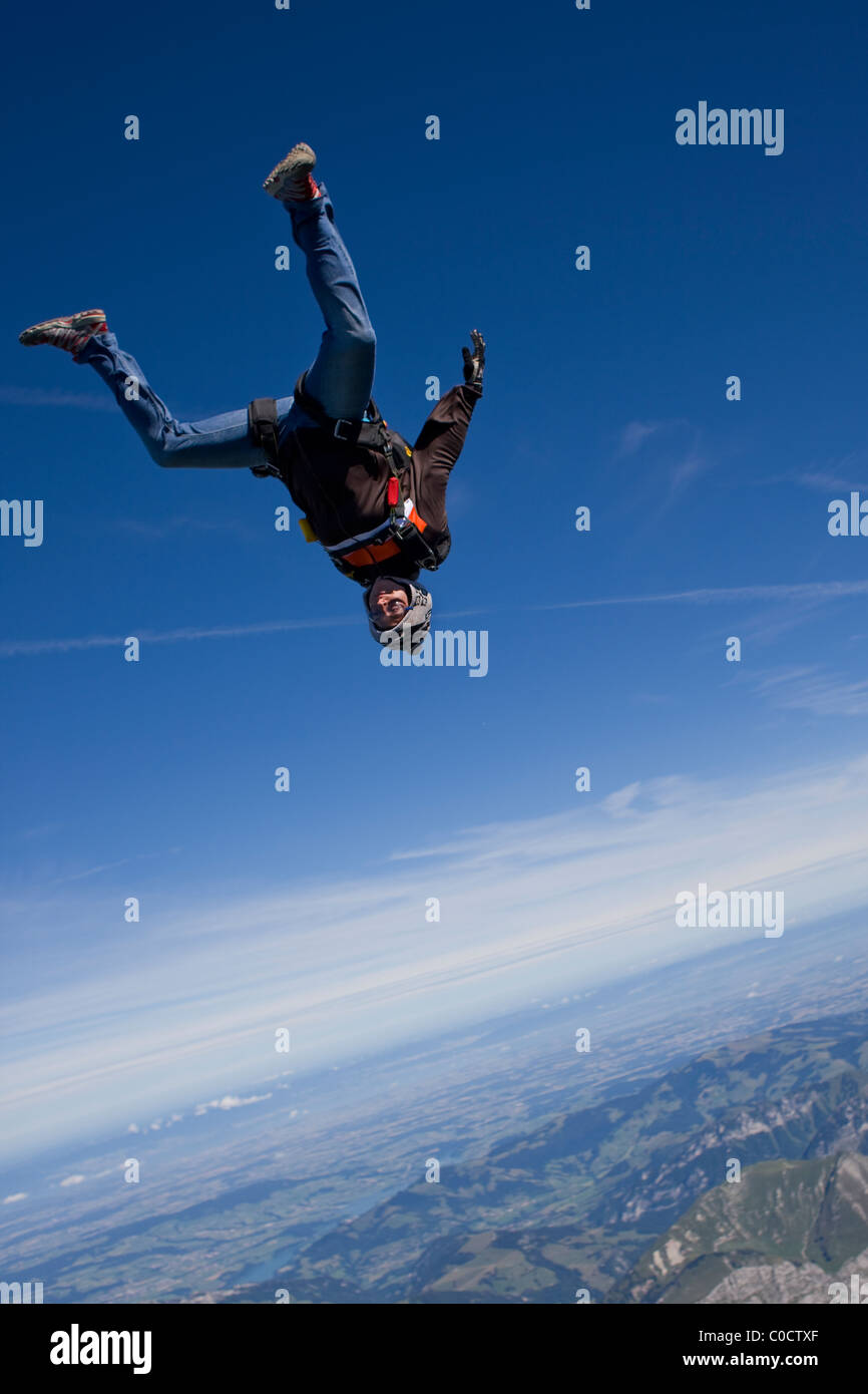 Girl is training head down flight position in freefall with 150 MPH ...