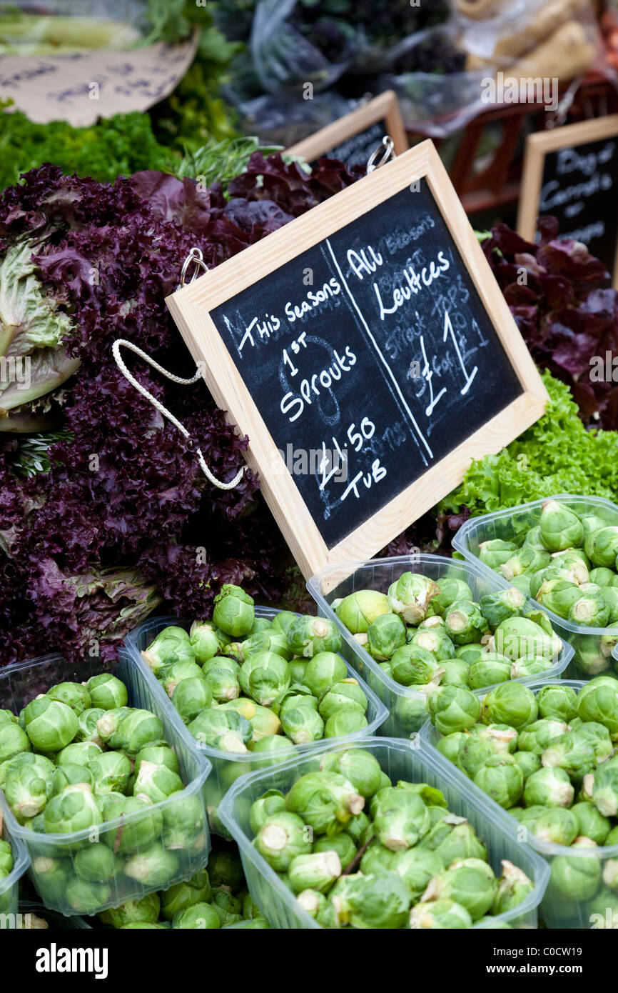 Display of brussels sprouts and red lettuce on a market stall Stock ...