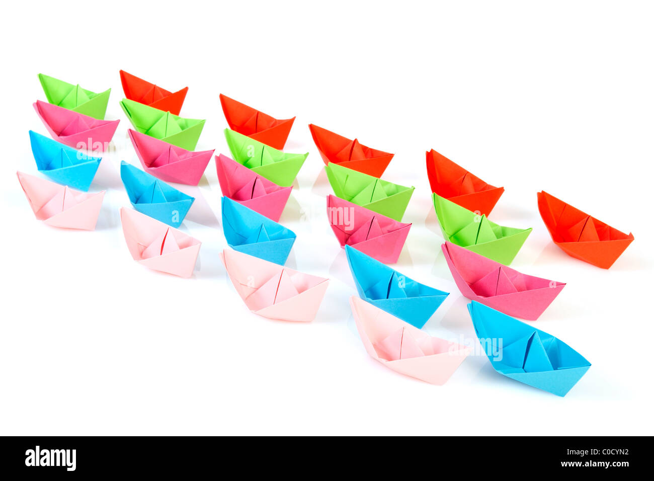 Many colorful paper boats in rows isolated over white Stock Photo - Alamy
