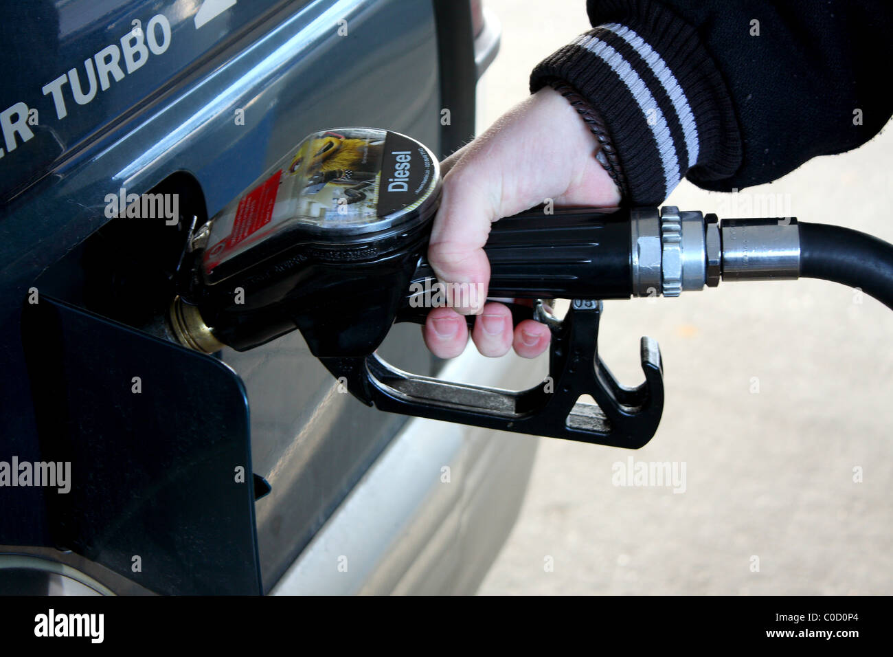 An empty petrol station forecourt with unleaded and diesel fuel closed ...