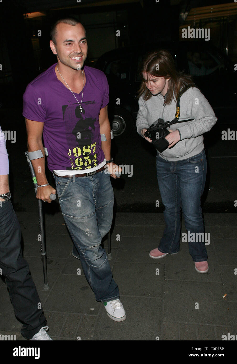 Andy scott lee on crutches leaving the embassy nightclub hi-res stock ...