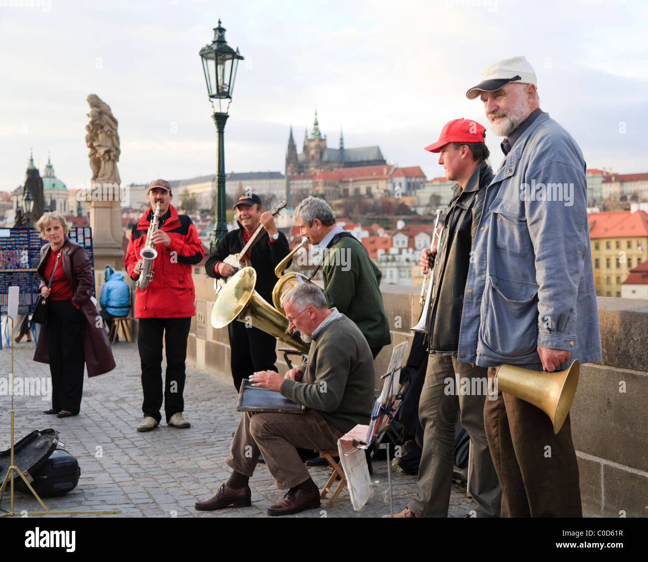 Jazz band busking on Charles Bridge Prague with the castle in the ...