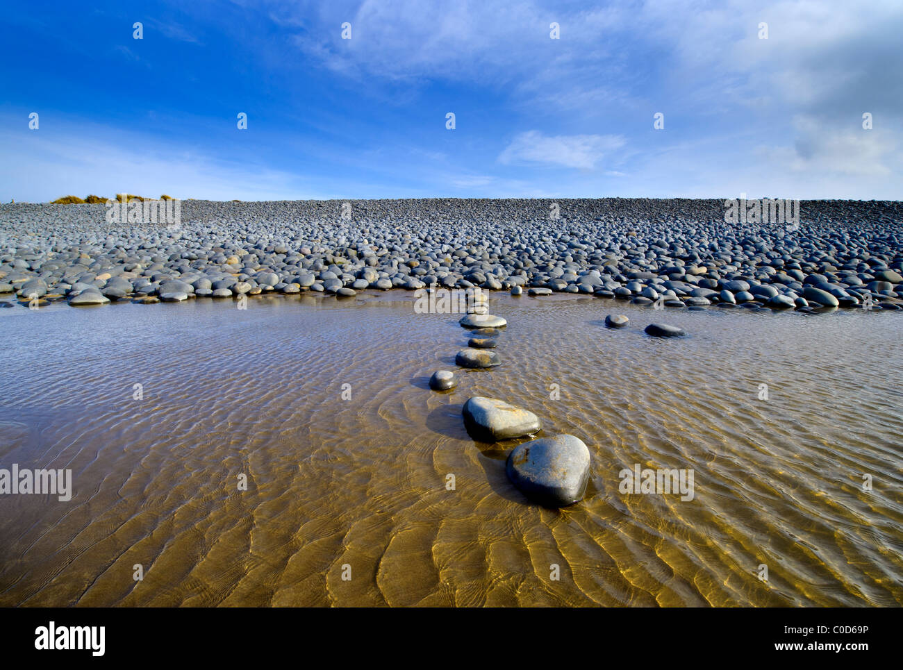 rounded pebbles stepping stones at Northam Burrows on the North Devon ...