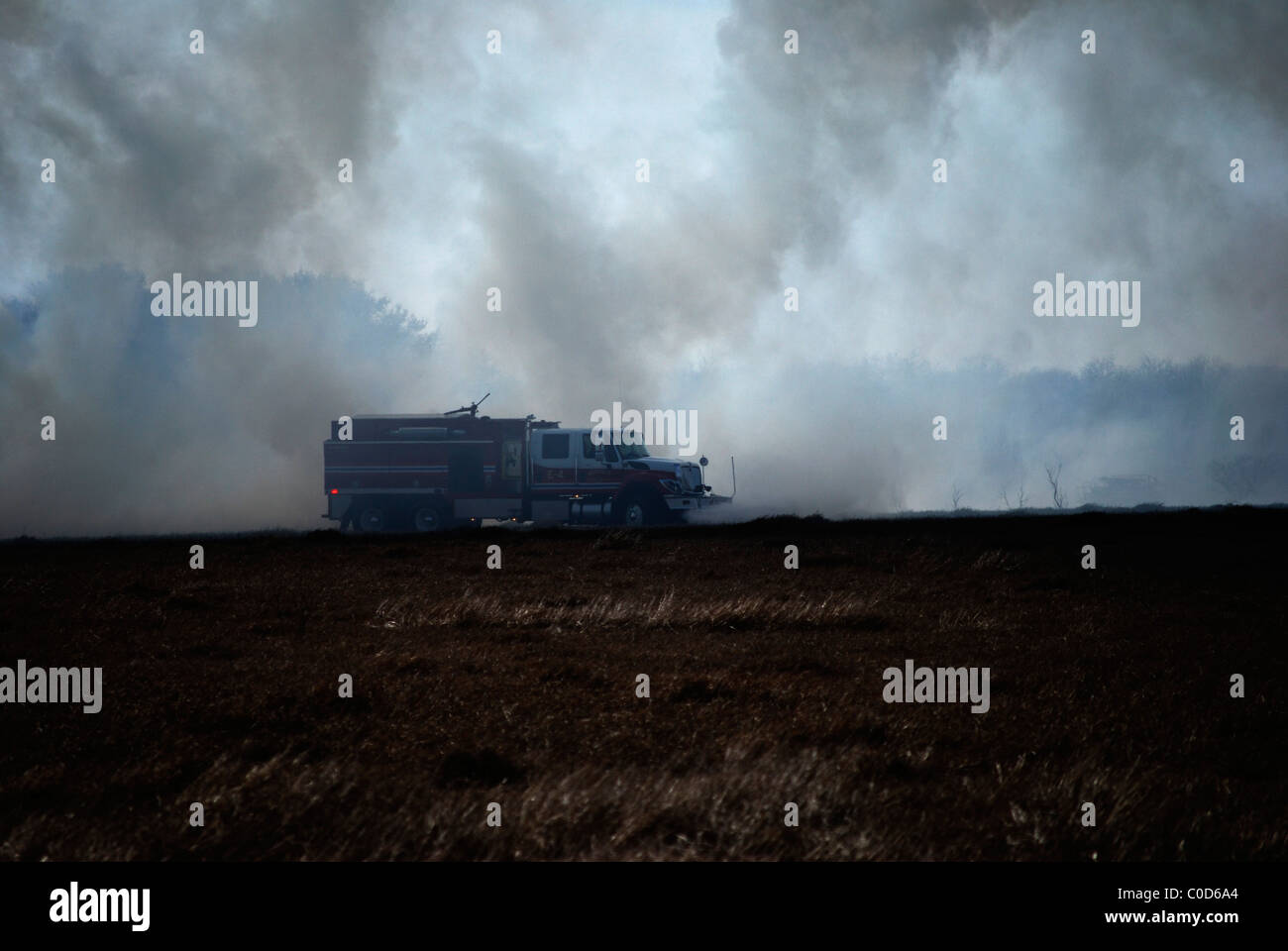 Fire truck battles huge grass fire on the Texas prairie in south Texas ...