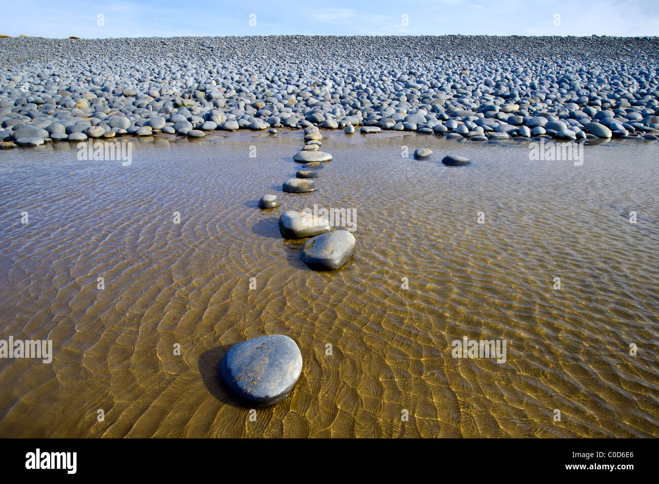 rounded pebbles stepping stones at Northam Burrows on the North Devon ...