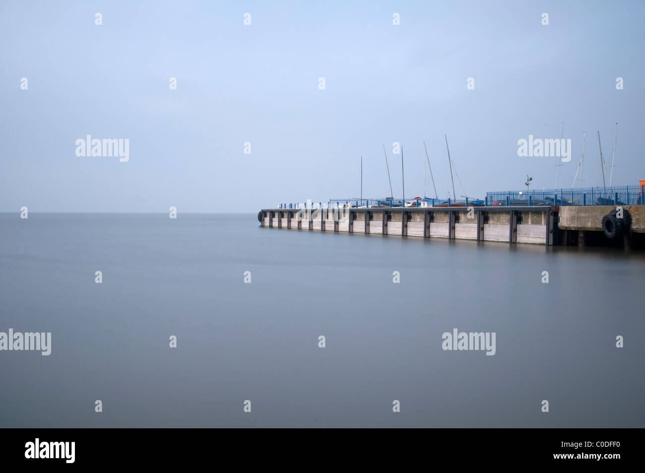 Whitstable Beach and harbour at high tide Kent England UK Stock Photo ...