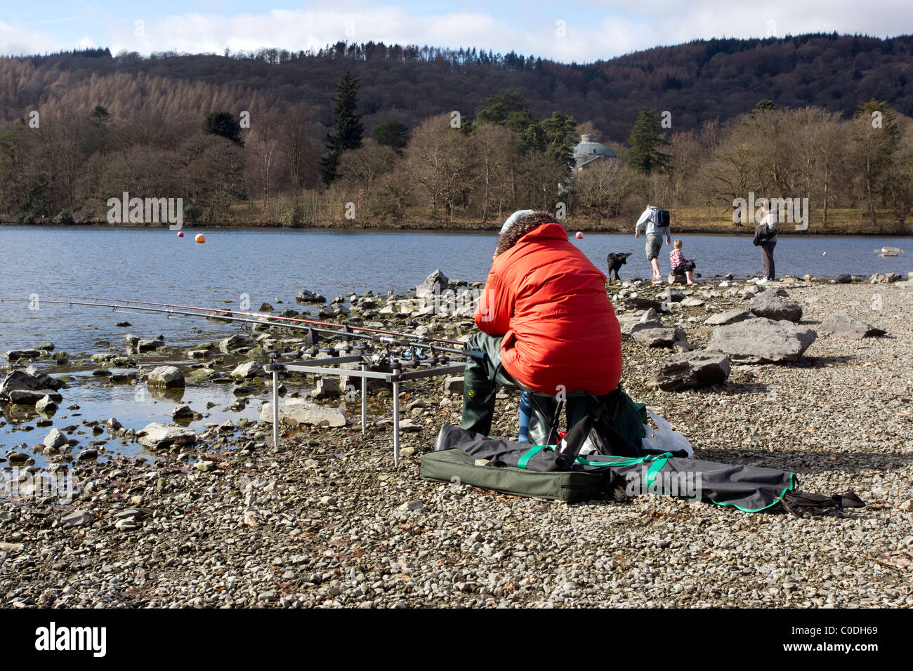 Fisherman with rod & line on Lake Windermere waiting for a catch with ...