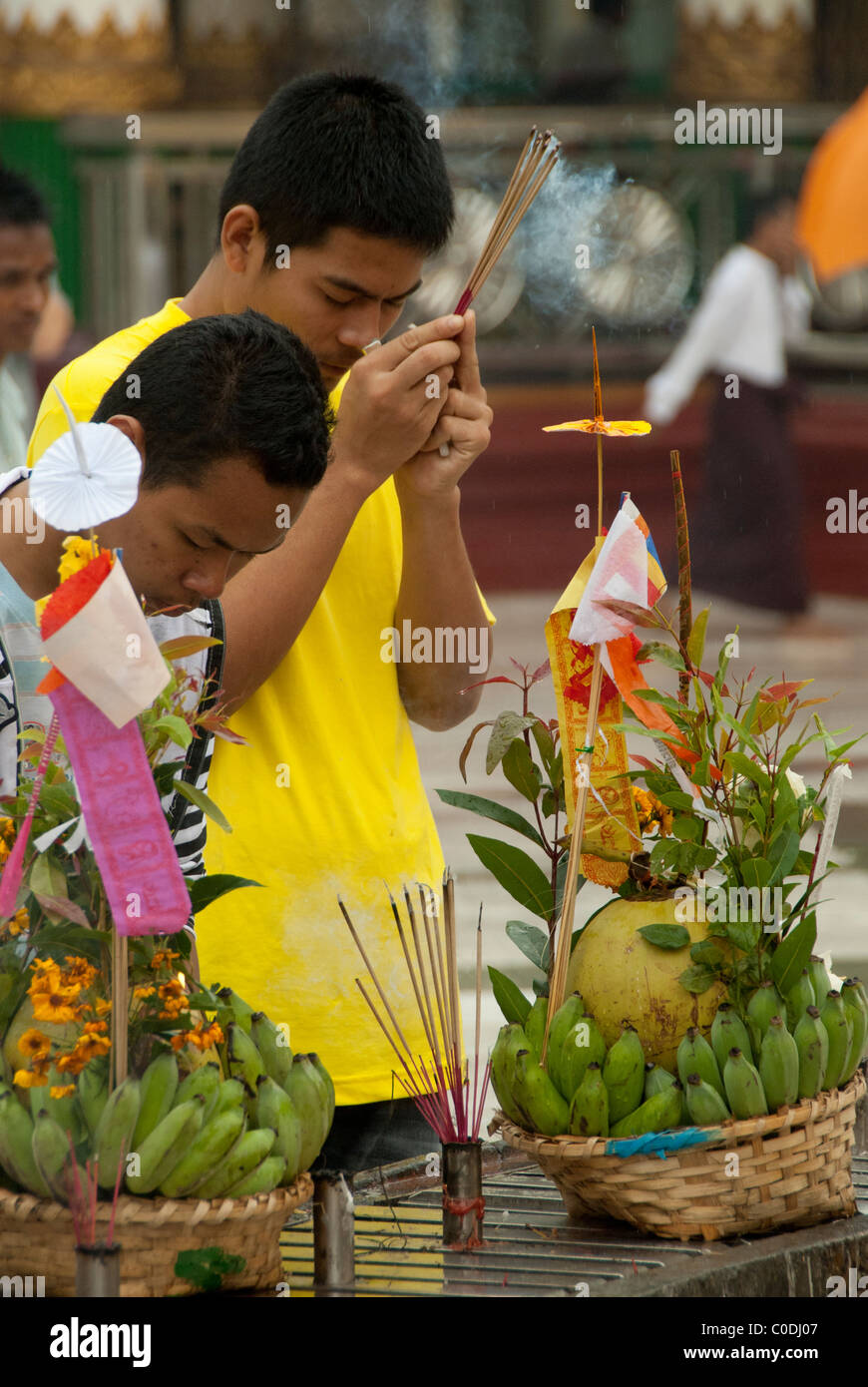 Buddhist food offering altar hi-res stock photography and images - Alamy
