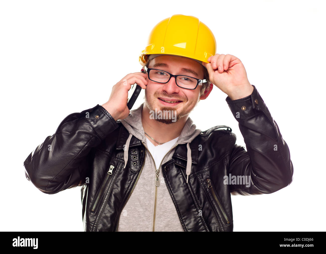 Handsome Young Man in Hard Hat Talking on Cell Phone Isolated on a ...