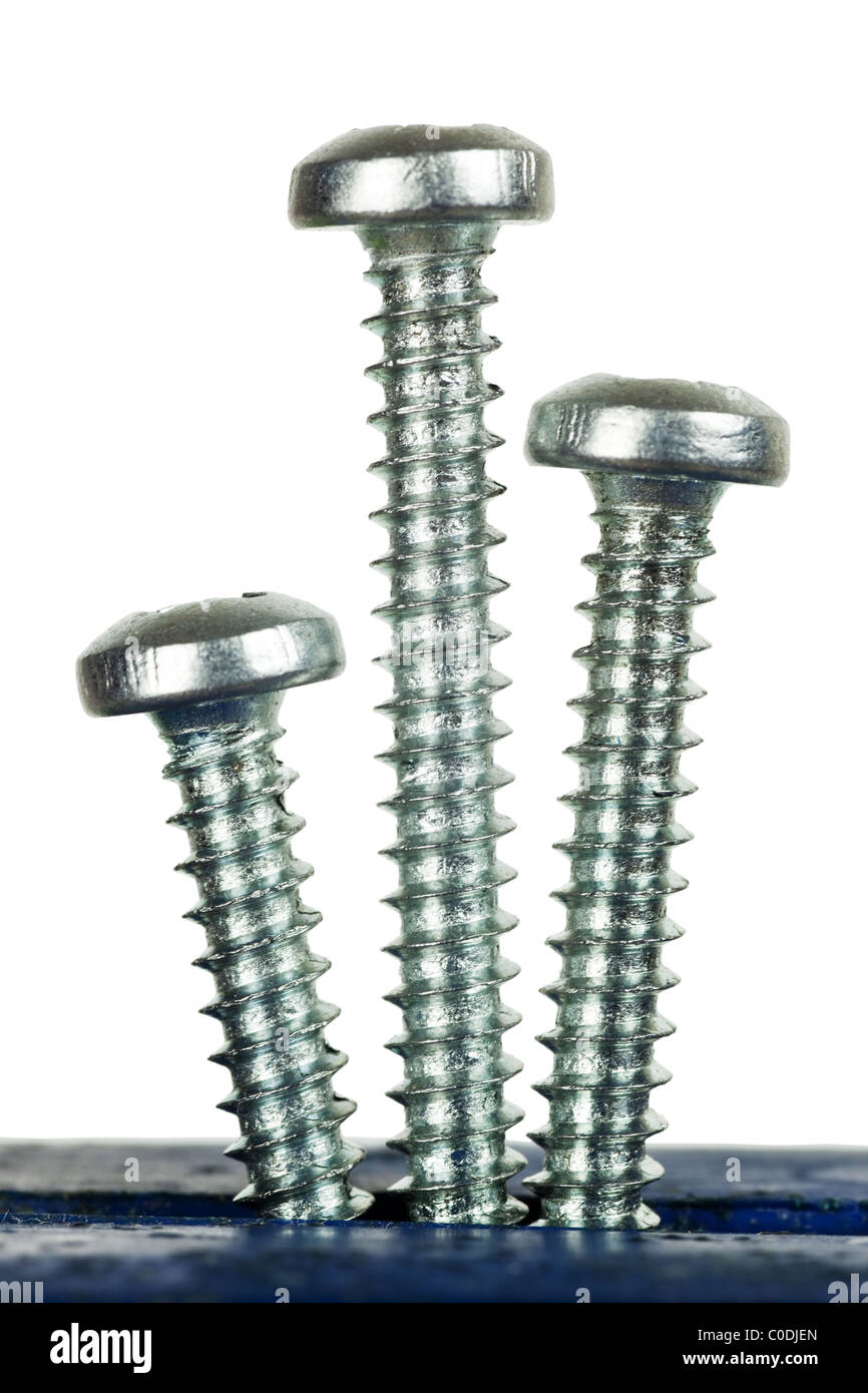 Three screws isolated on white background Stock Photo - Alamy