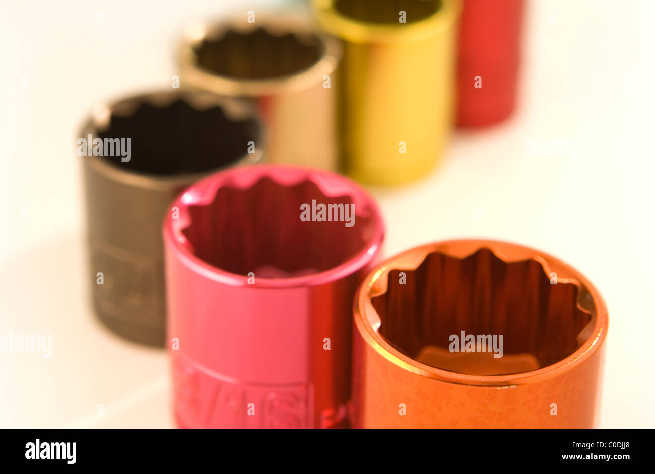 Color coded metal sockets from a socket wrench set Stock Photo - Alamy
