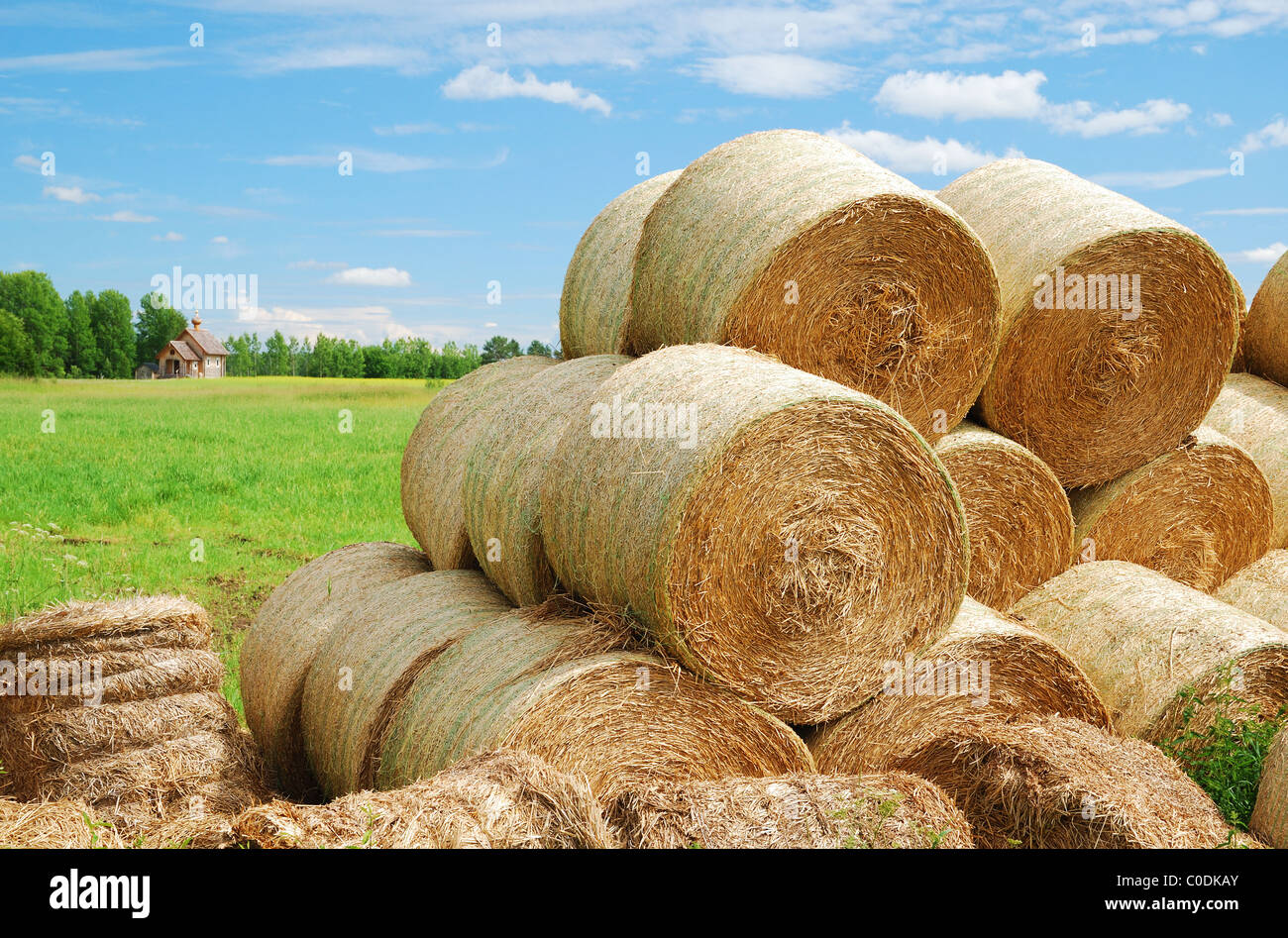 Country landscape with heap of straw bales Stock Photo - Alamy