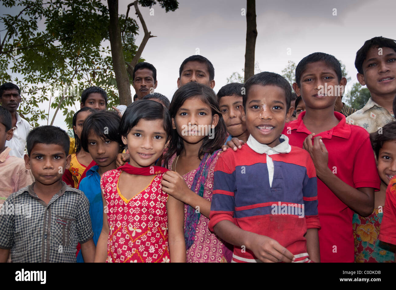 A group of young Bangladeshi children from a small village south of ...