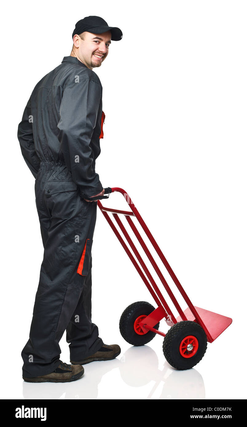 smiling caucasian manual worker with handtruck isolated on white Stock ...