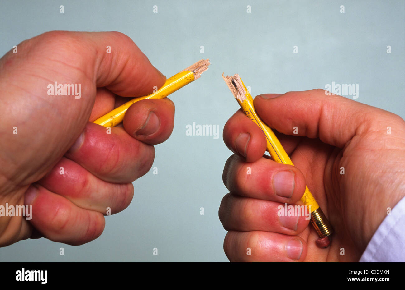 Snapping pencil hi-res stock photography and images - Alamy