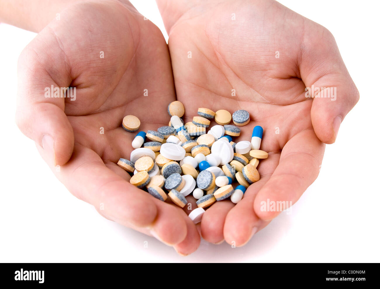 Hands offering Medicines isolated on white background Stock Photo - Alamy