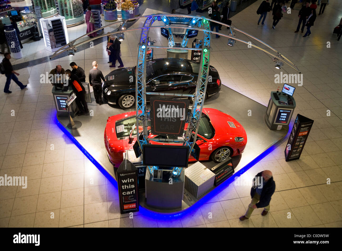 Competition stand for a luxury super car prize draw in the departure ...