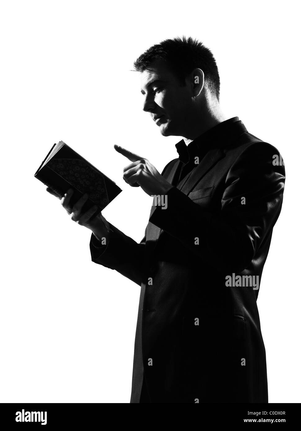 Man with book silhouette hi-res stock photography and images - Alamy