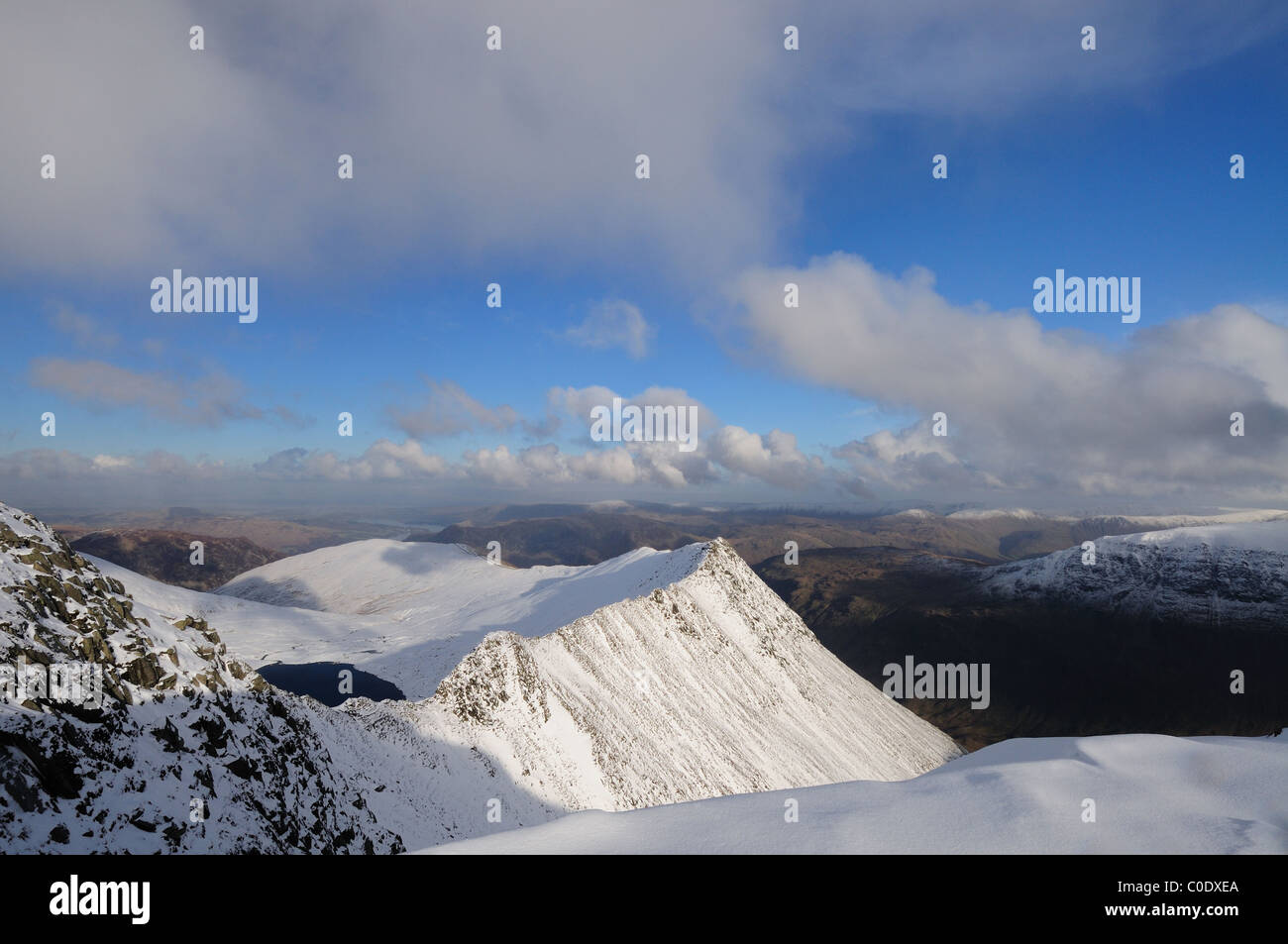 View over Striding Edge from Helvellyn in winter in the English Lake ...