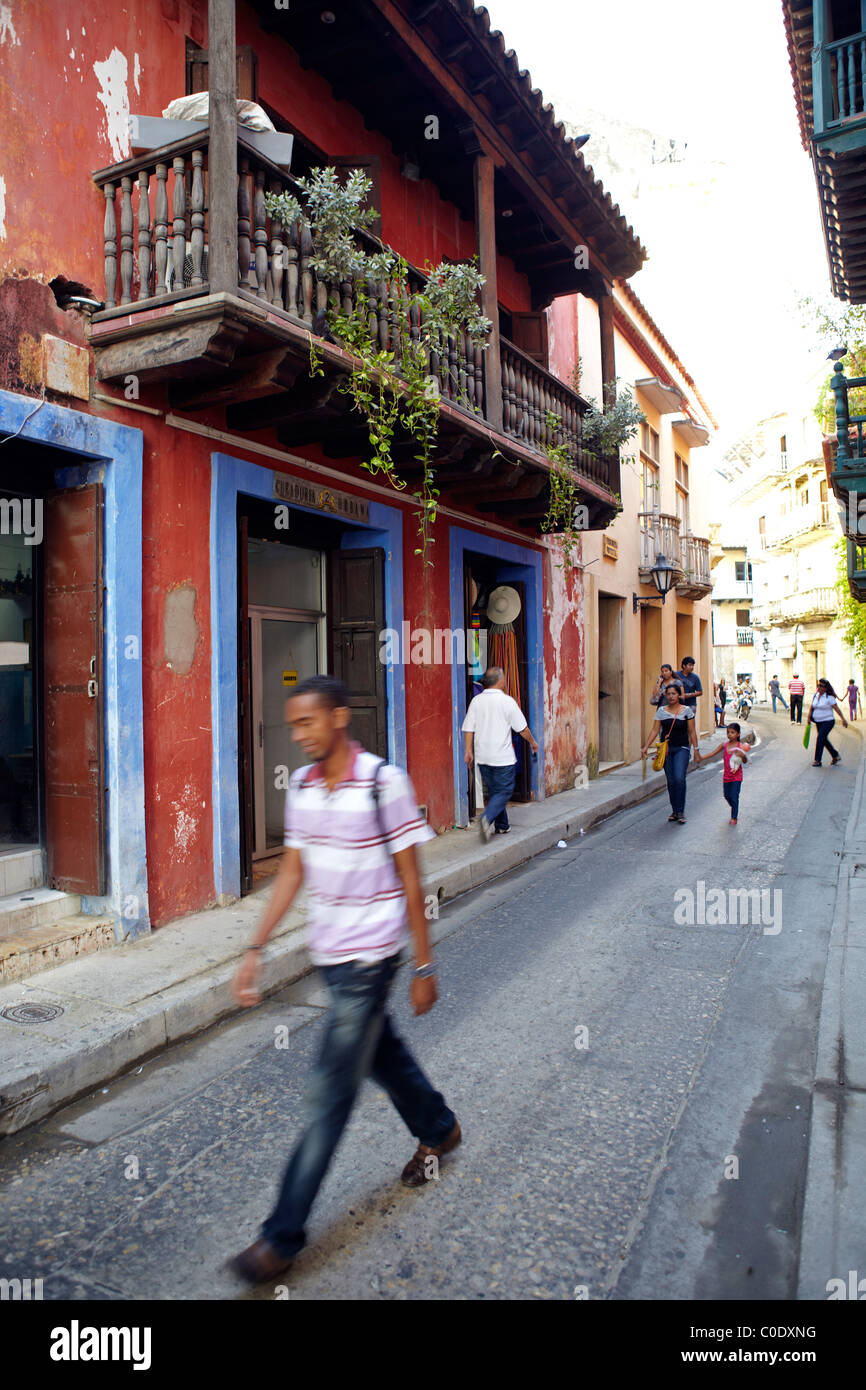 Man walking down narrow street hi-res stock photography and images - Alamy