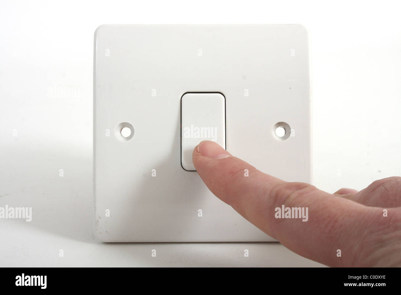 Pressing a light switch Stock Photo - Alamy