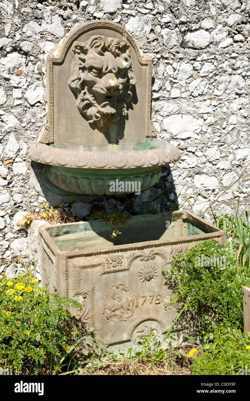 Water feature and dry lead water trough – dated 1776 – in a courtyard ...